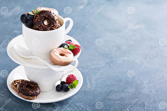 Small Mini Donuts in Stacked Coffee Cups Stock Image - Image of ...