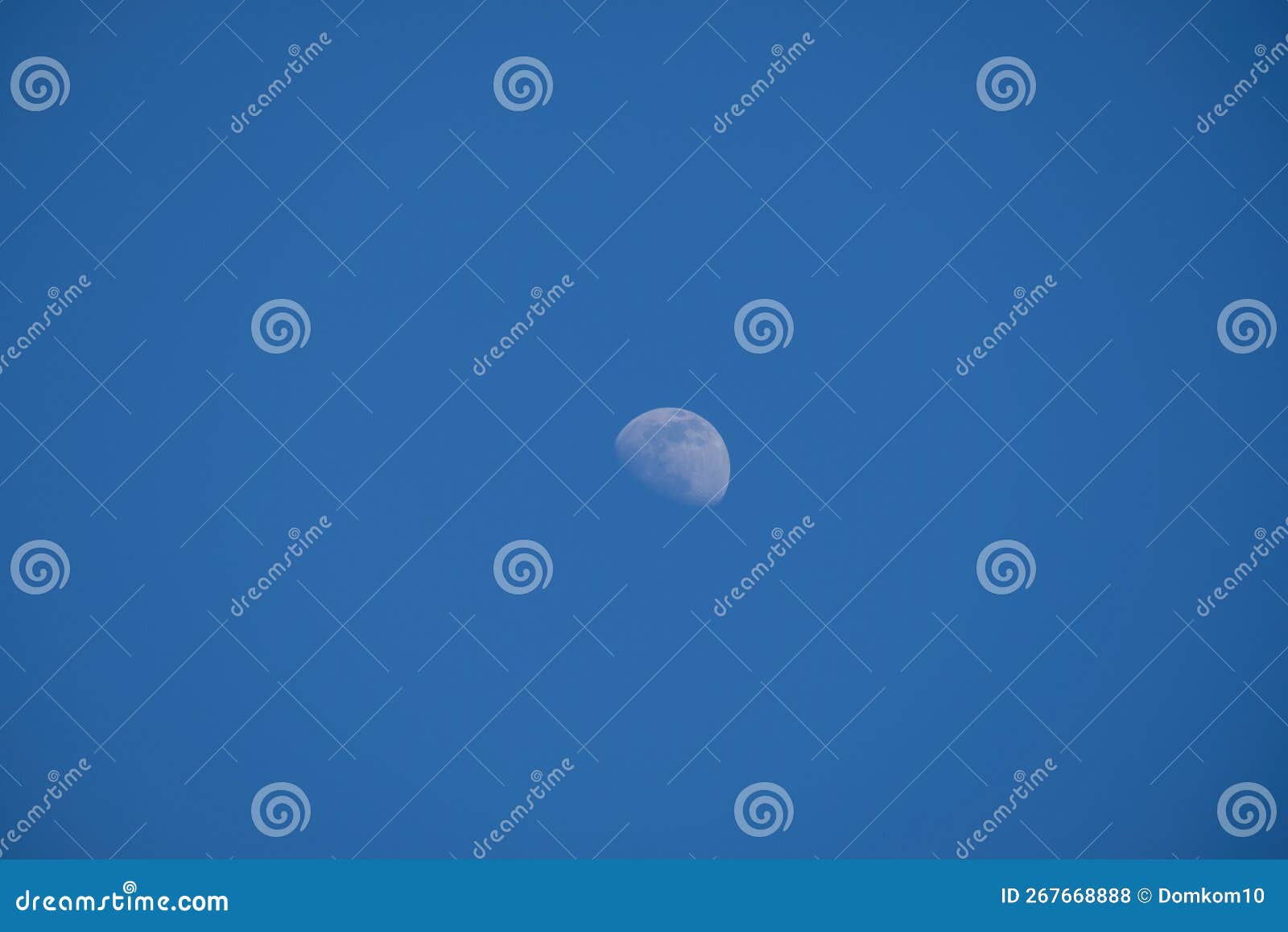 Small Moon on a Blue Background Stock Photo - Image of crater ...