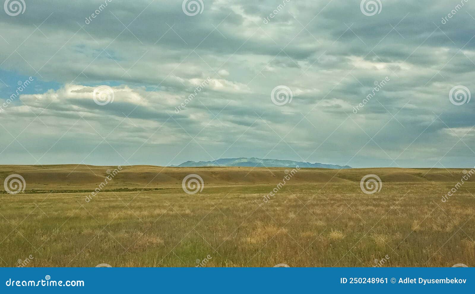 A Small Mountain Range is Visible in the Distance from the Steppe ...