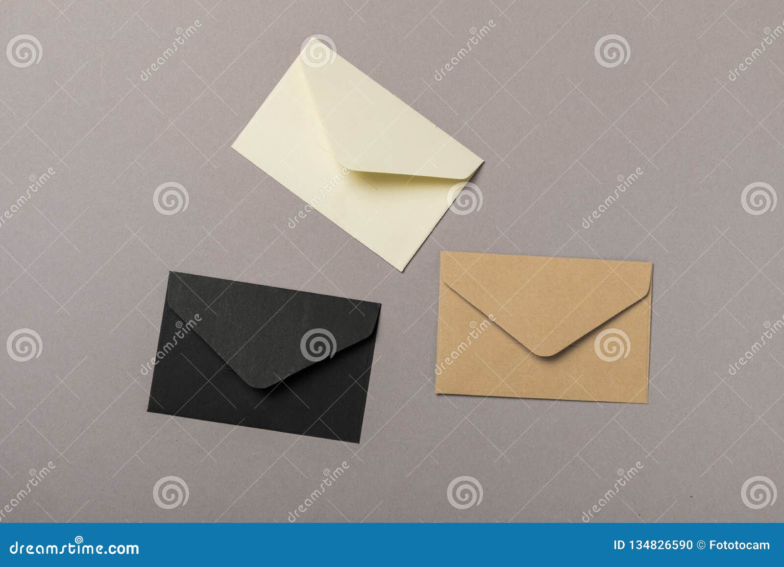 Small Multi-colored Envelopes on a Gray Background Stock Photo - Image ...
