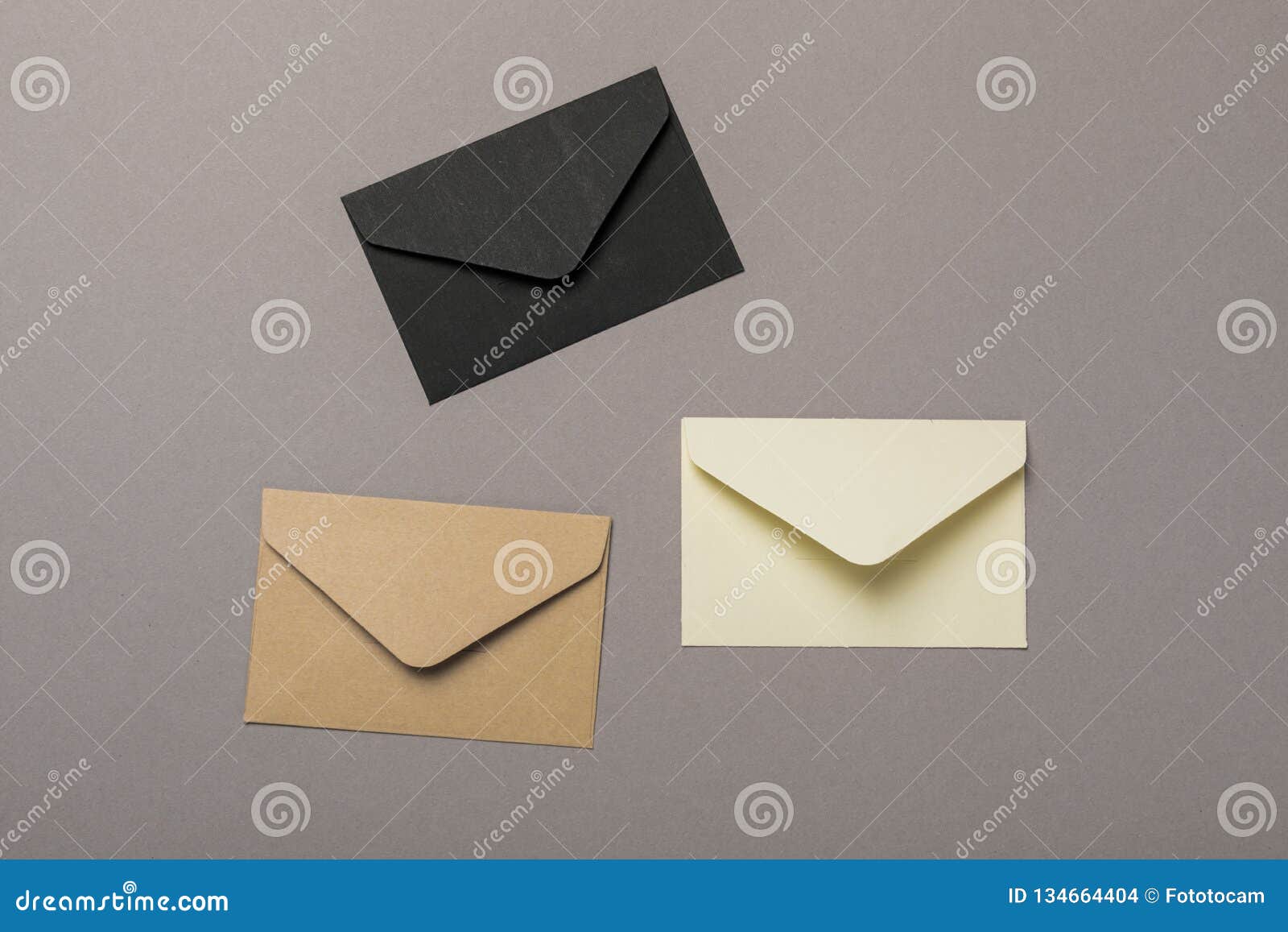 Small Multi-colored Envelopes on a Gray Background Stock Photo - Image ...