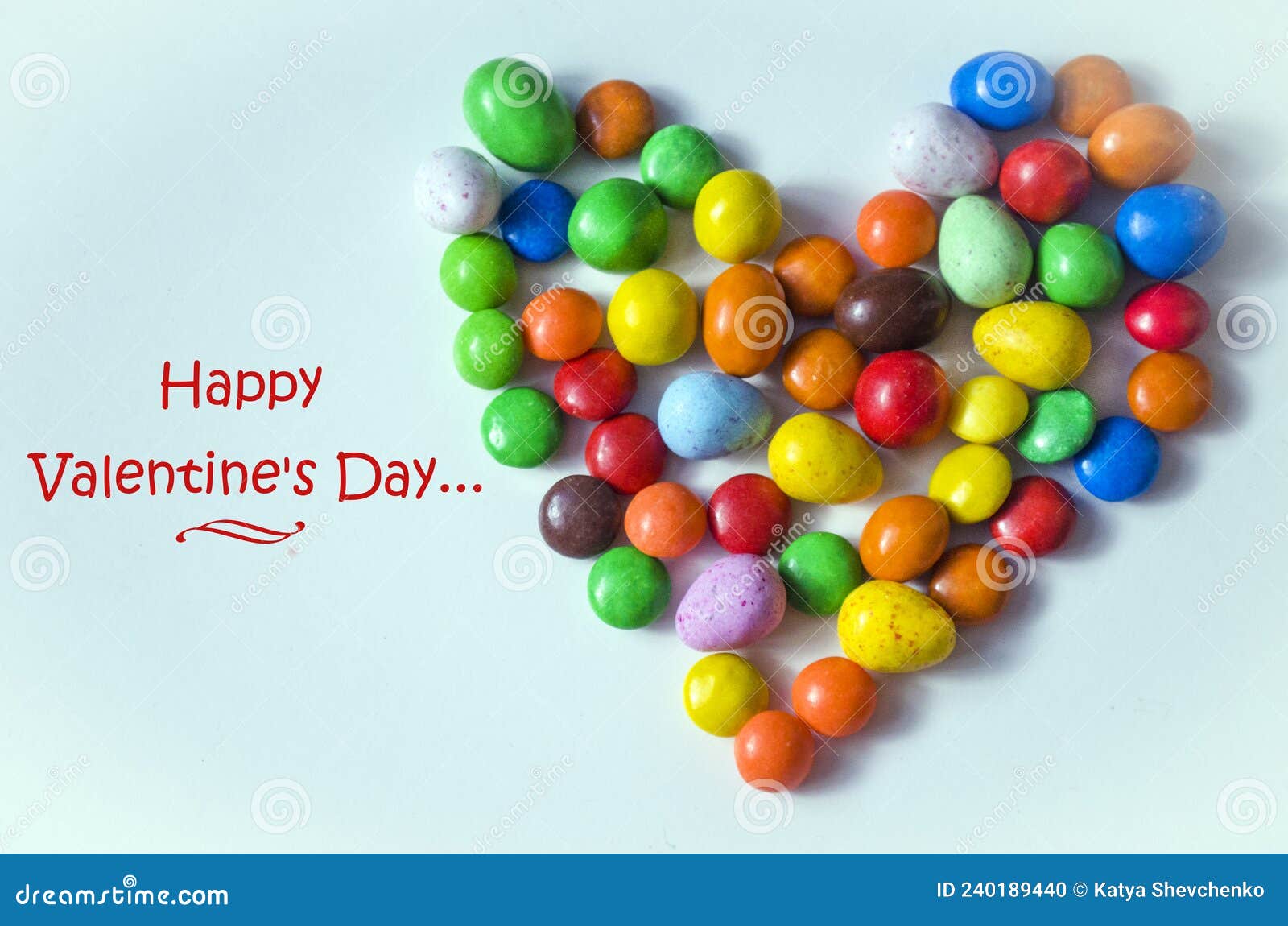 Small Multi-colored Sweets in the Form of a Heart on a White Background ...