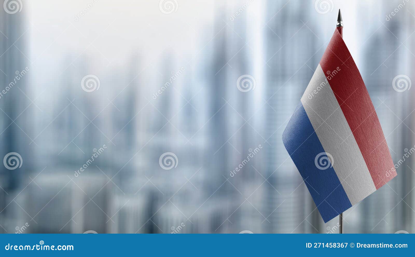 A Small Netherlands Flag on an Abstract Blurry Background Stock ...