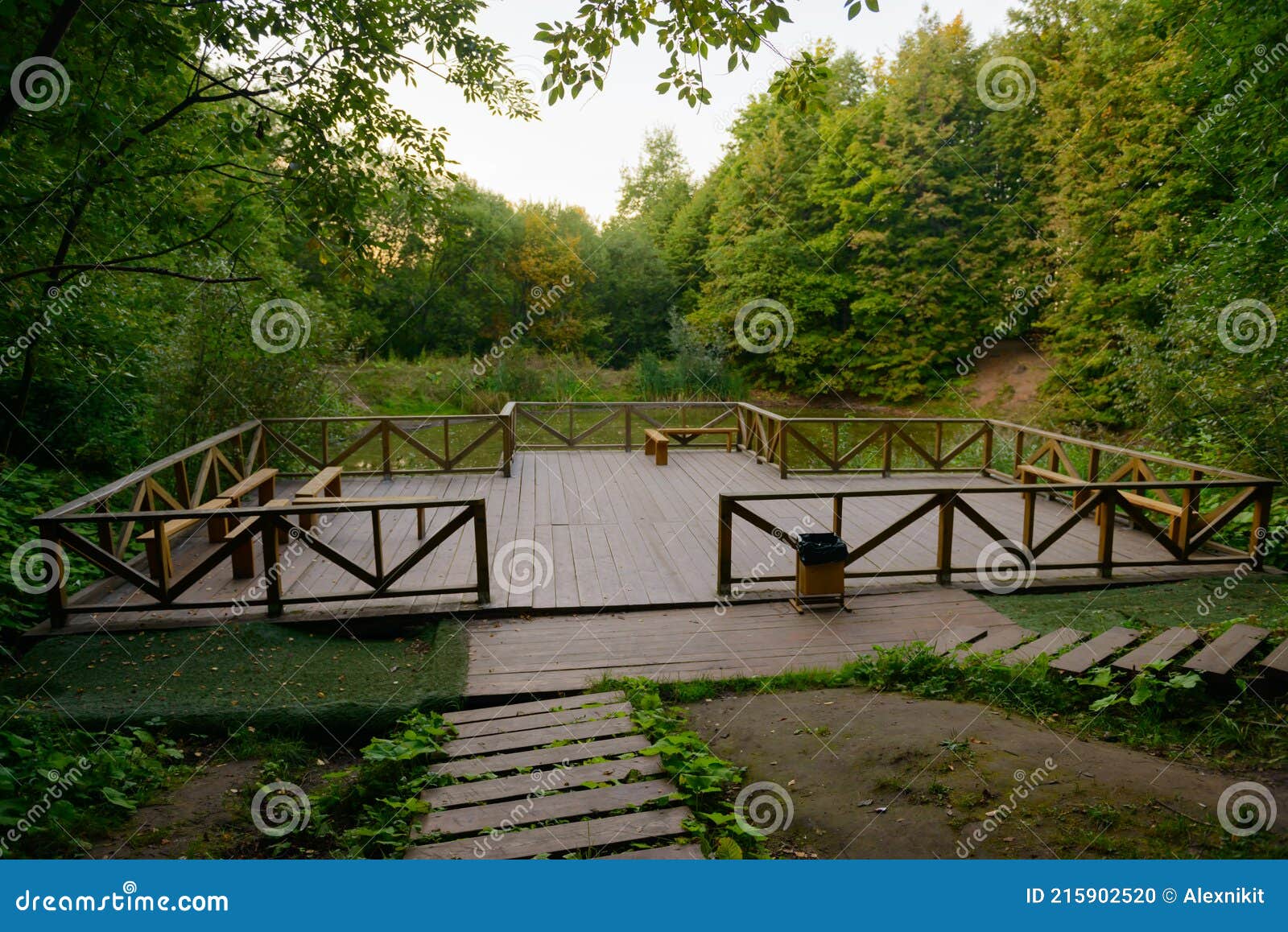 Small Observation Deck Made of Wood in the Middle of the Forest with a ...