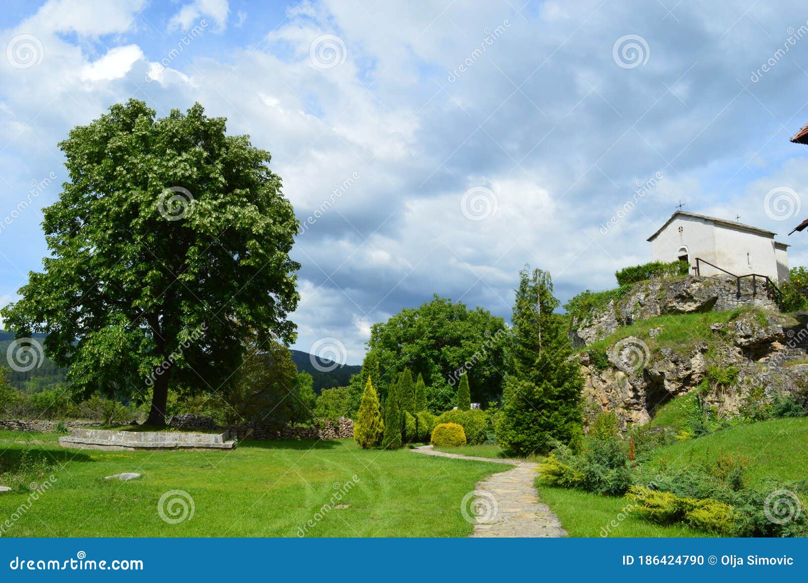 Small old church on a hill stock photo. Image of colors - 186424790