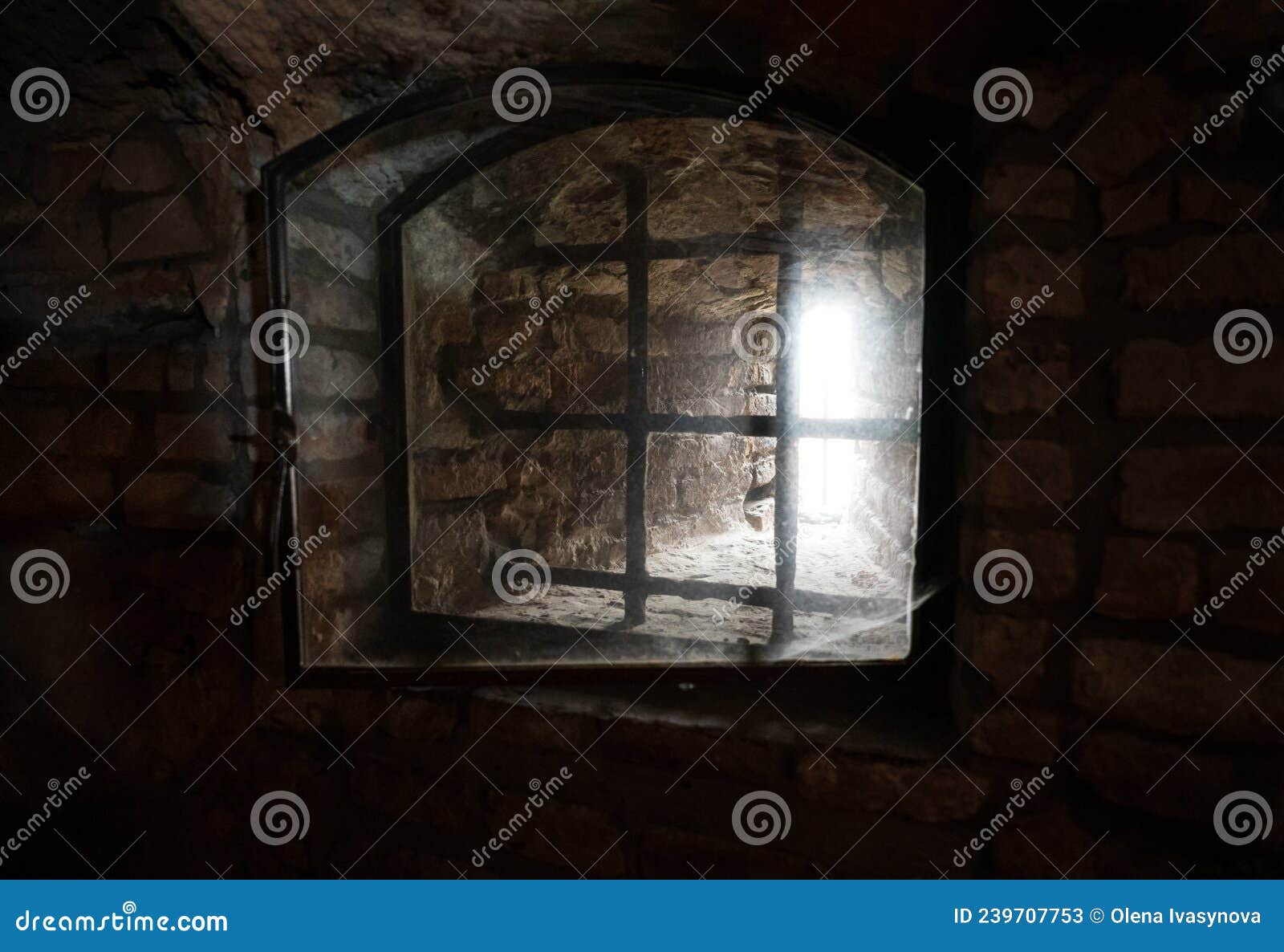 A Small Old Prison Window with an Ajar Glass Frame through Which ...