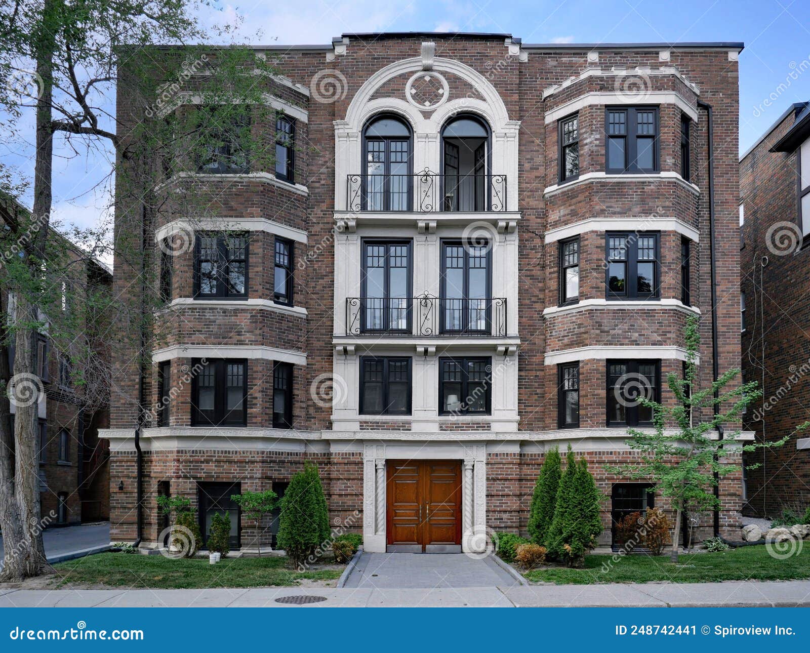 Brick apartment building stock image. Image of fashioned - 248742441