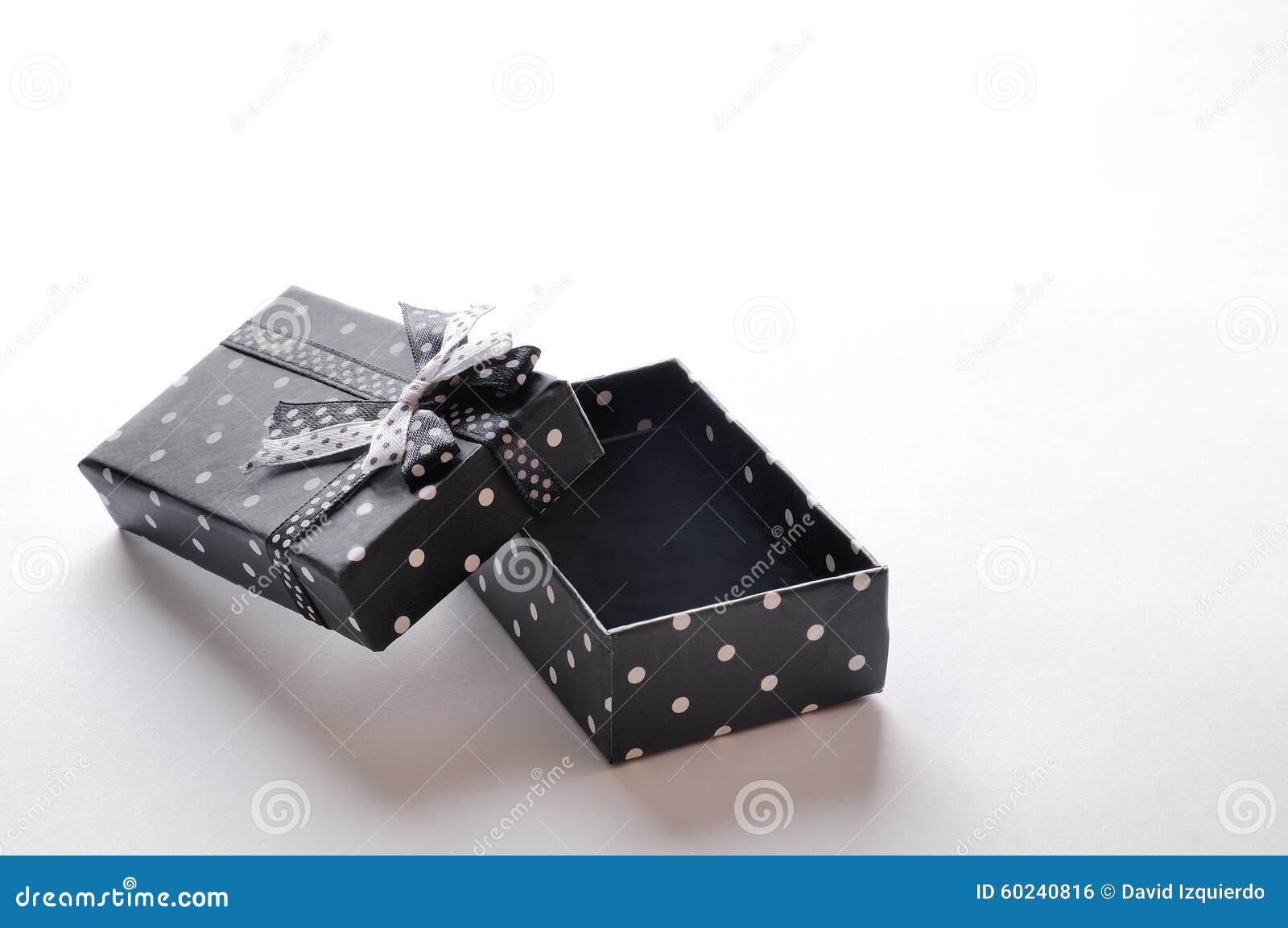 Small Open Black Gift Box with Ribbon and Circles Stock Photo - Image ...