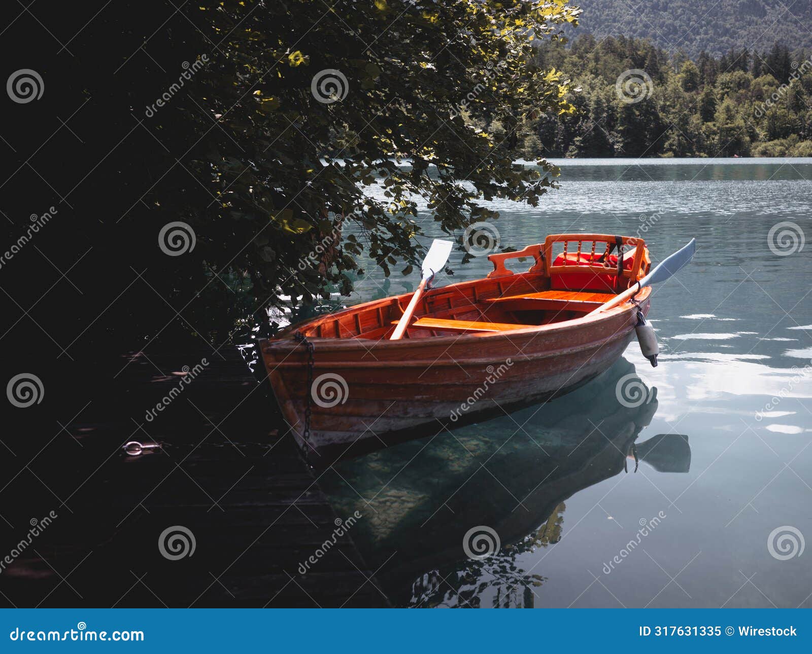 Small Orange Boat on a Serene Lake Stock Image - Image of nautical ...