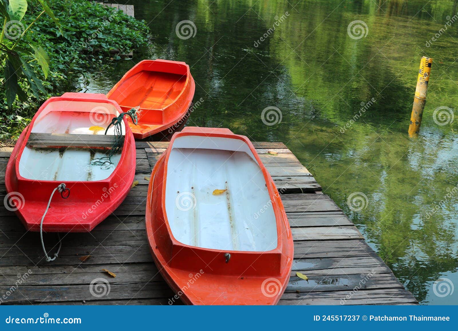 Small Orange Plastic Boats Moored in the River for Paddling. Stock ...