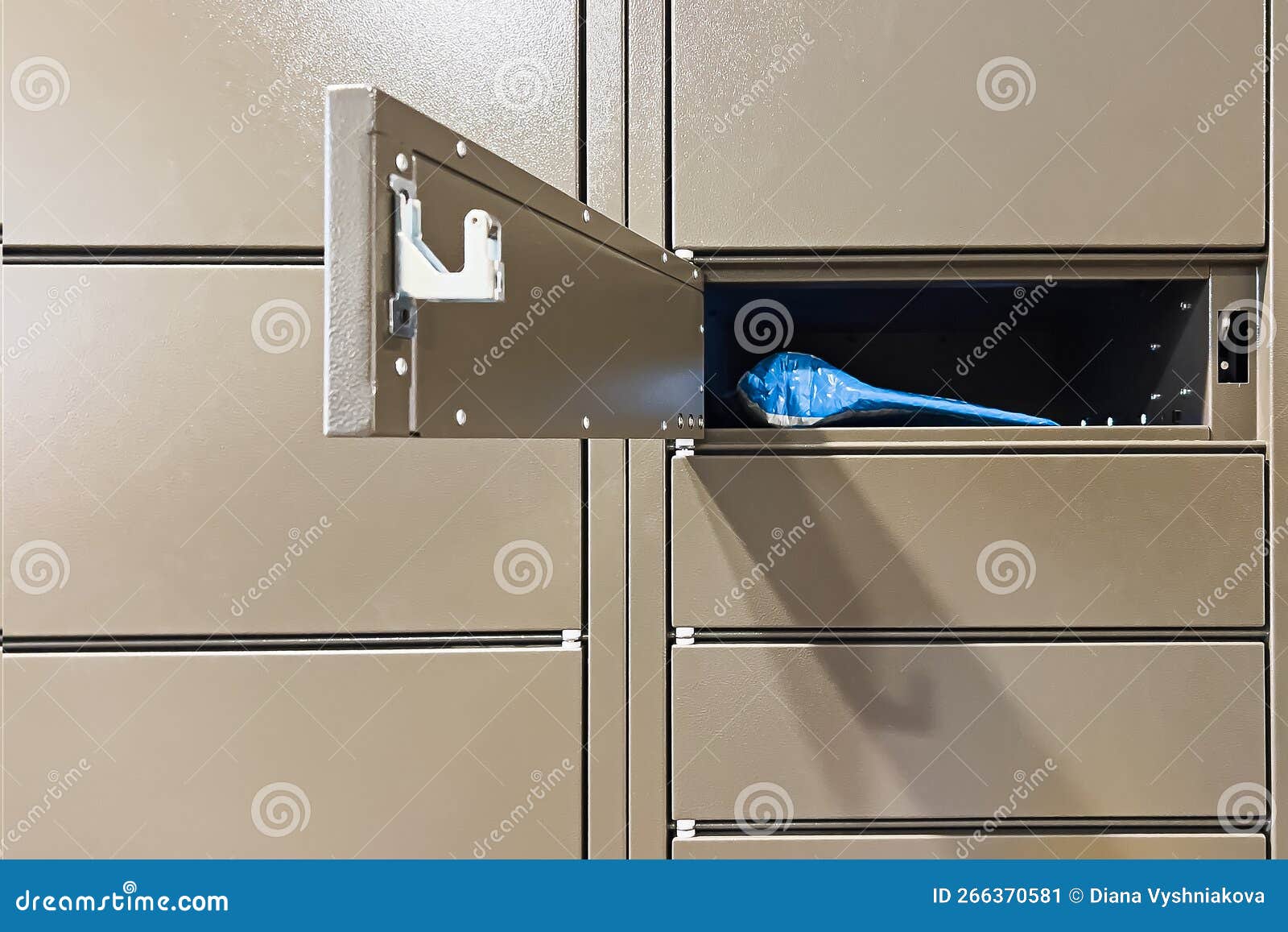 Small Parcel for Pick-up in the Opened Locker Stock Image - Image of ...