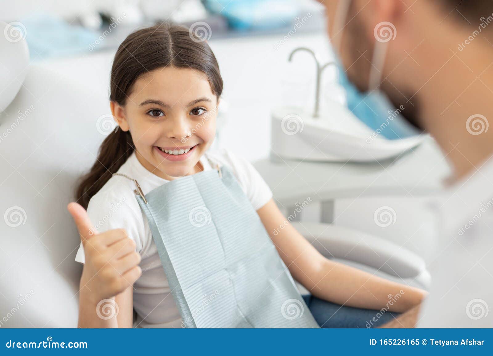 Small Patient Looking at the Camera Showing Thumb Up Stock Image ...