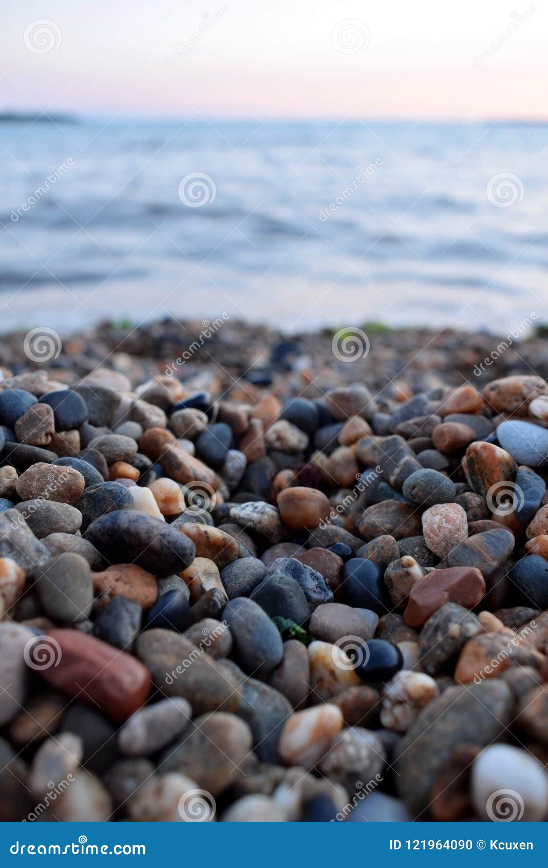 Small pebbles at the beach stock photo. Image of coast - 121964090