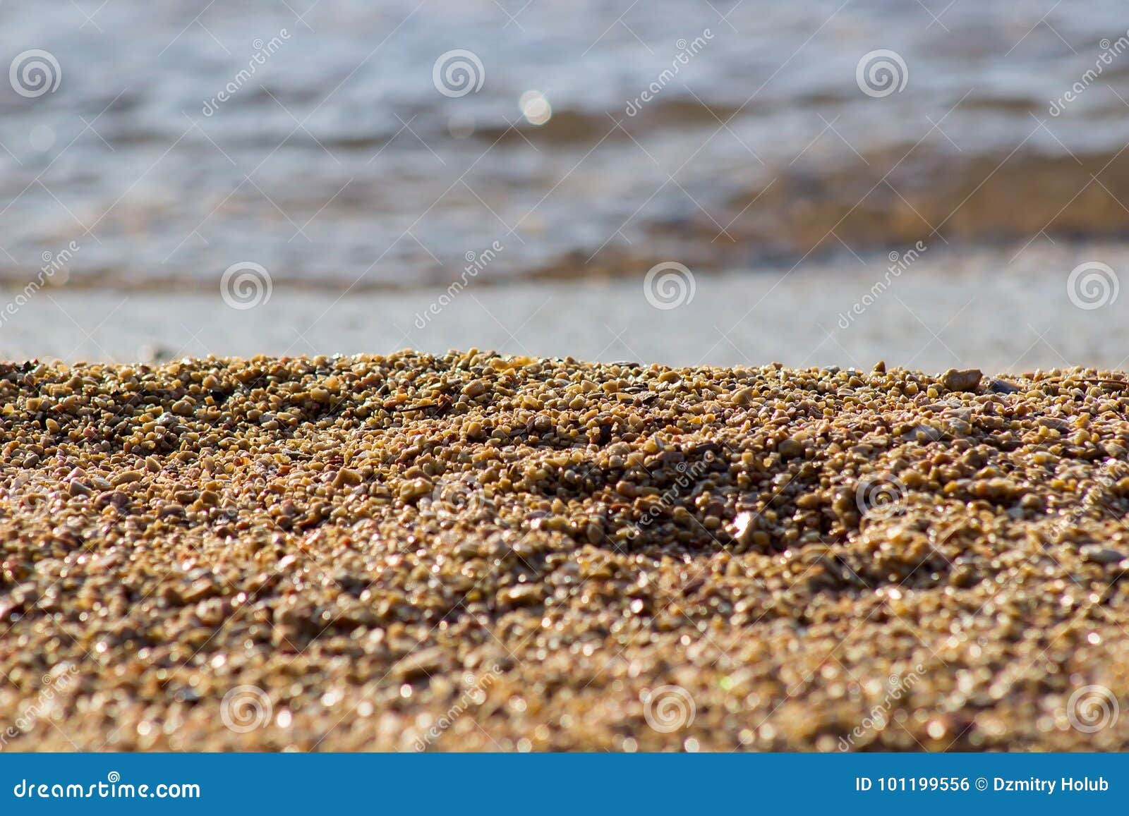 Small pebbles on the beach stock photo. Image of reflection - 101199556