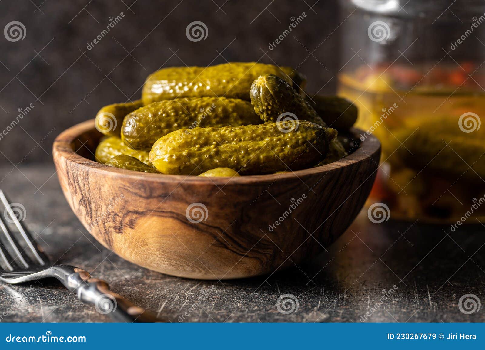 Small Pickles. Marinated Pickled Cucumbers in Wooden Bowl Stock Image ...