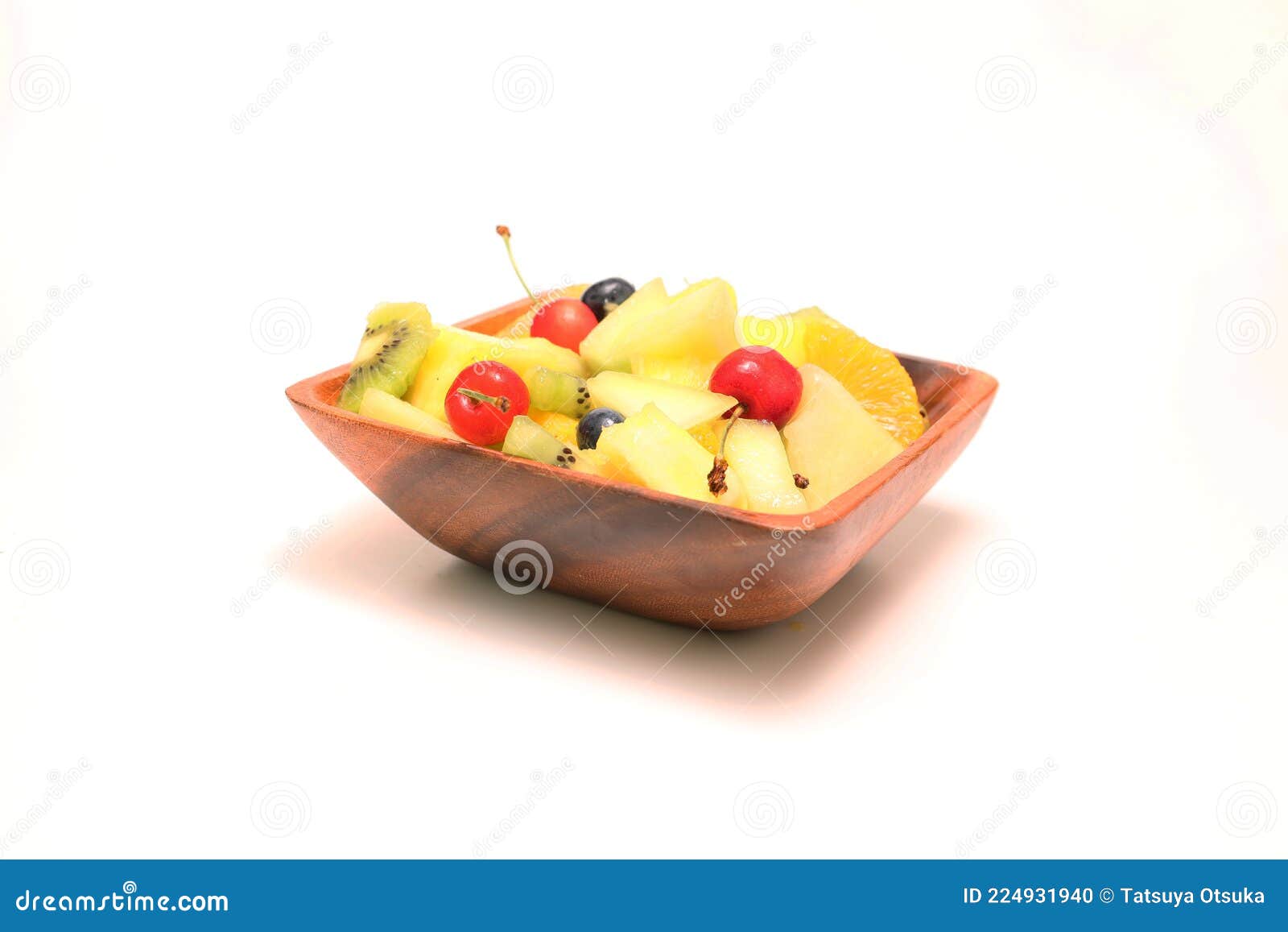 Small Pieces of Fruit Cut Up on a Wooden Bowl Stock Photo - Image of ...