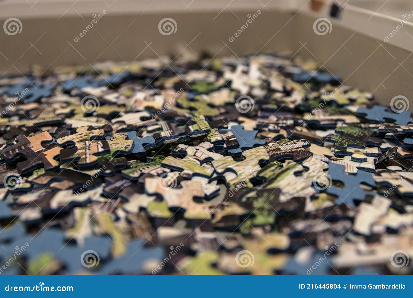 Small Pieces of a Puzzle, a Challenging Board Game. Stock Photo - Image ...