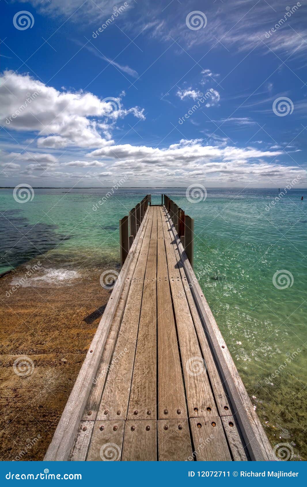 Small pier at August bay stock image. Image of posts - 12072711