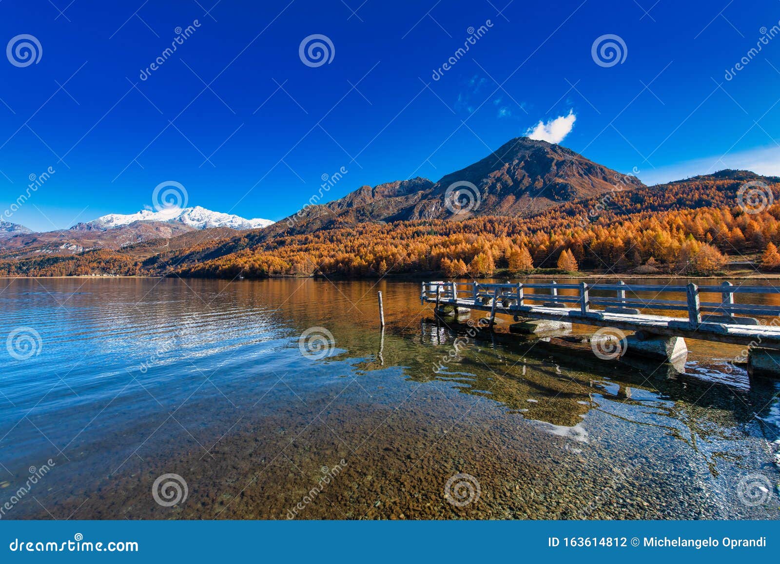 Small Pier on the Mountain Lake in the Swiss Alps Stock Photo - Image ...