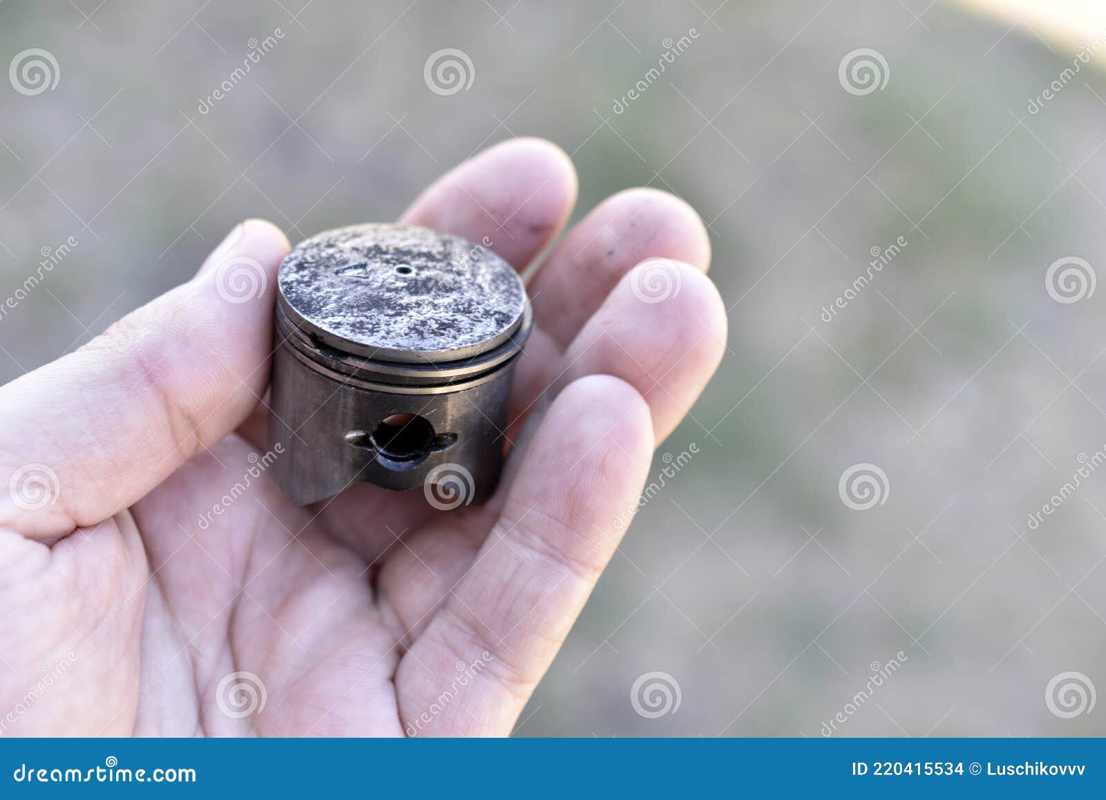 A Small Piston in the Hand from an Internal Combustion Engine Stock ...