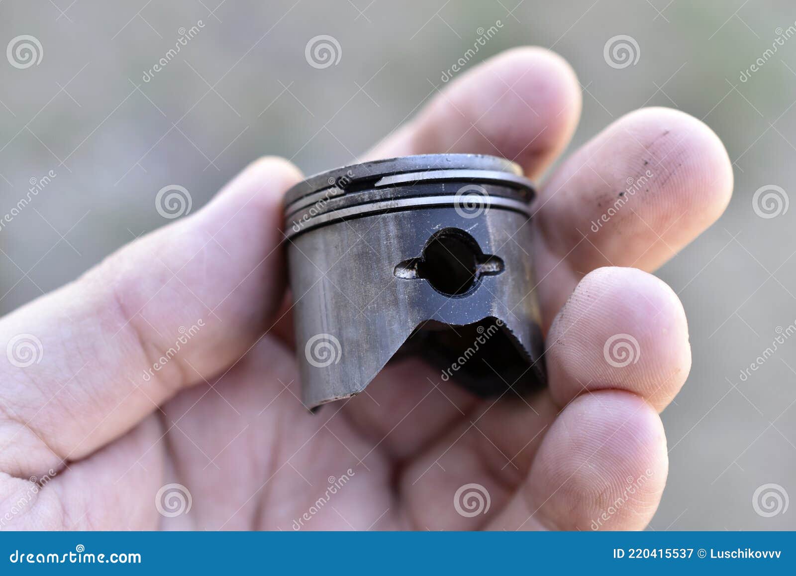 A Small Piston in the Hand from an Internal Combustion Engine Stock ...
