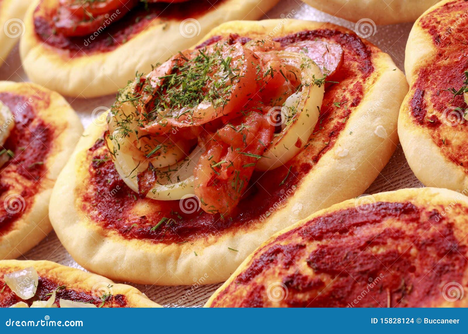 Small pizzas (pizzette) stock photo. Image of prepared - 15828124