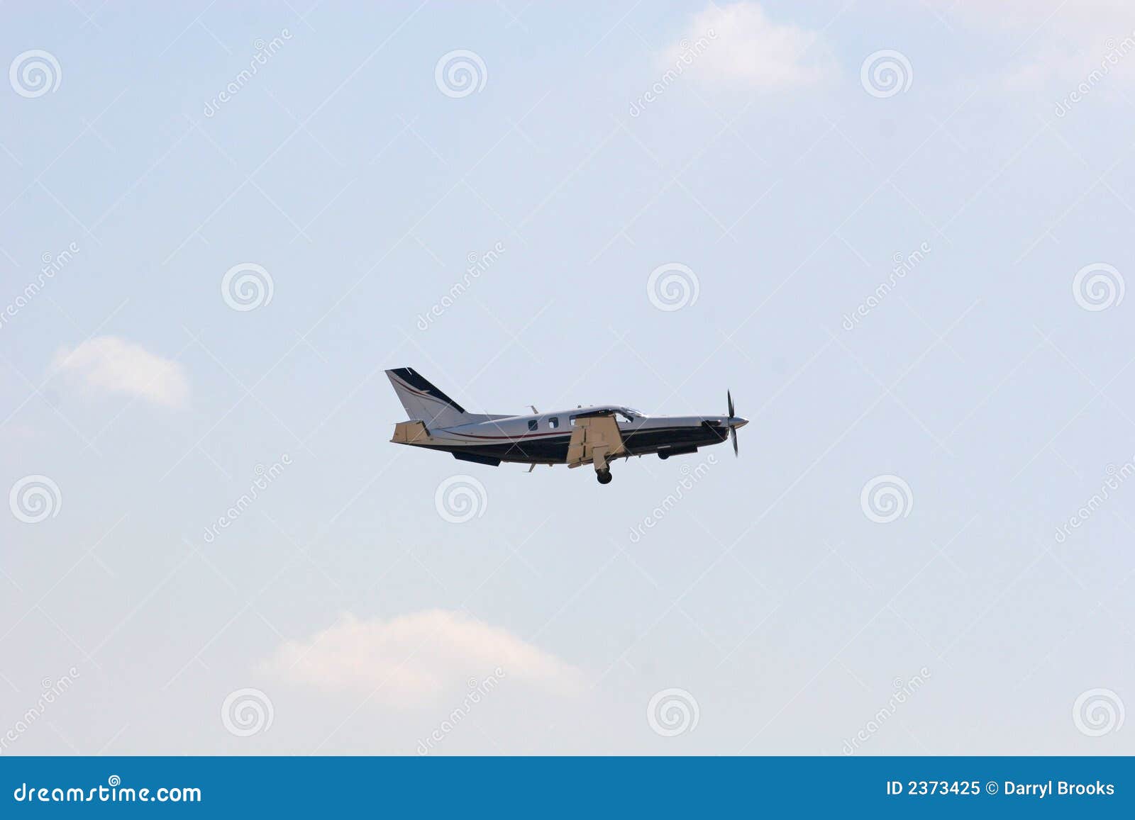 Small Plane in Flight stock image. Image of white, brown - 2373425