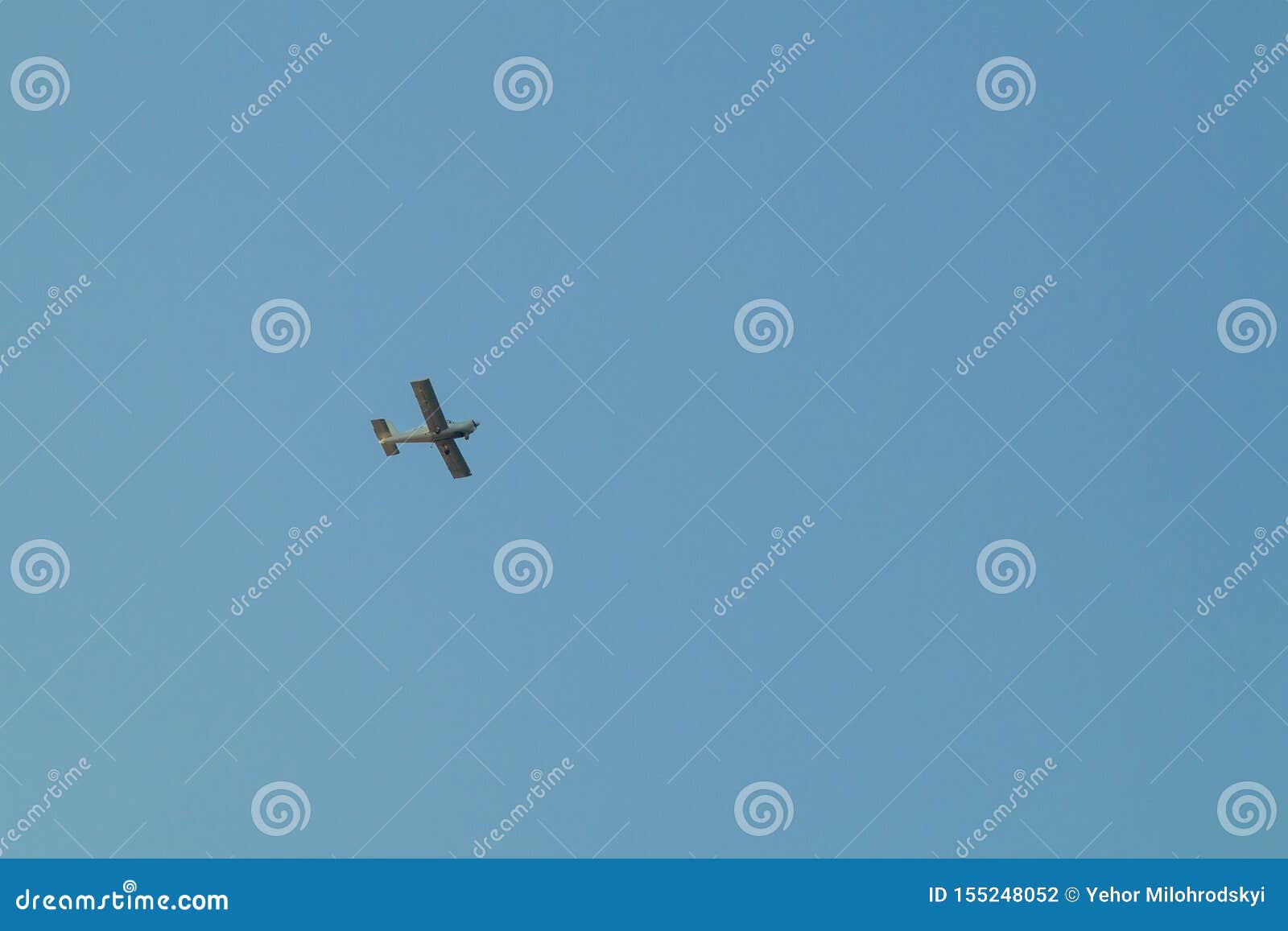 Small Plane Flying Low in the Sky Stock Photo - Image of flying, flight ...