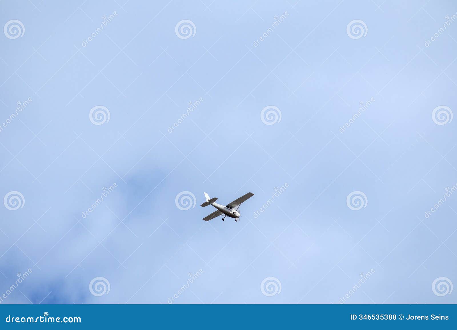 .small Plane in the Sky on a Blue Background Stock Photo - Image of ...