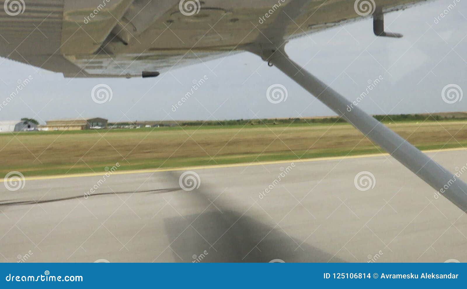 Small Plane Taking Off from Cockpit with a Wing in the Frame Stock ...