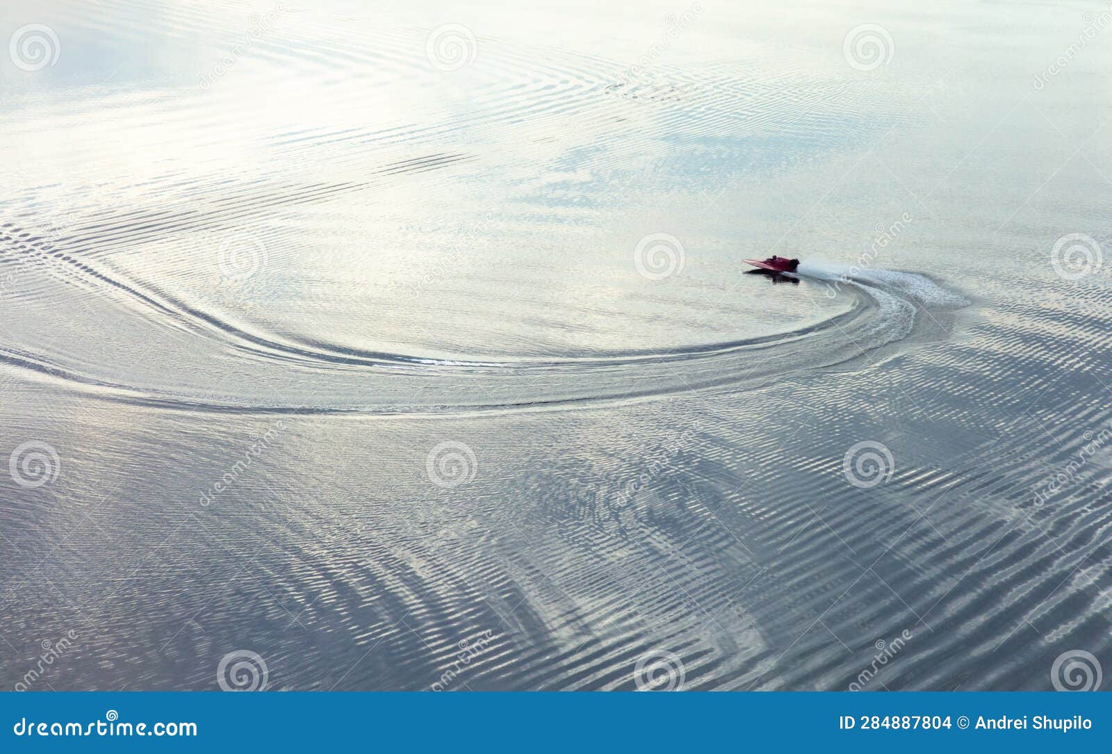 A Small Plastic Boat Floats on the Surface of the Water Stock Photo ...