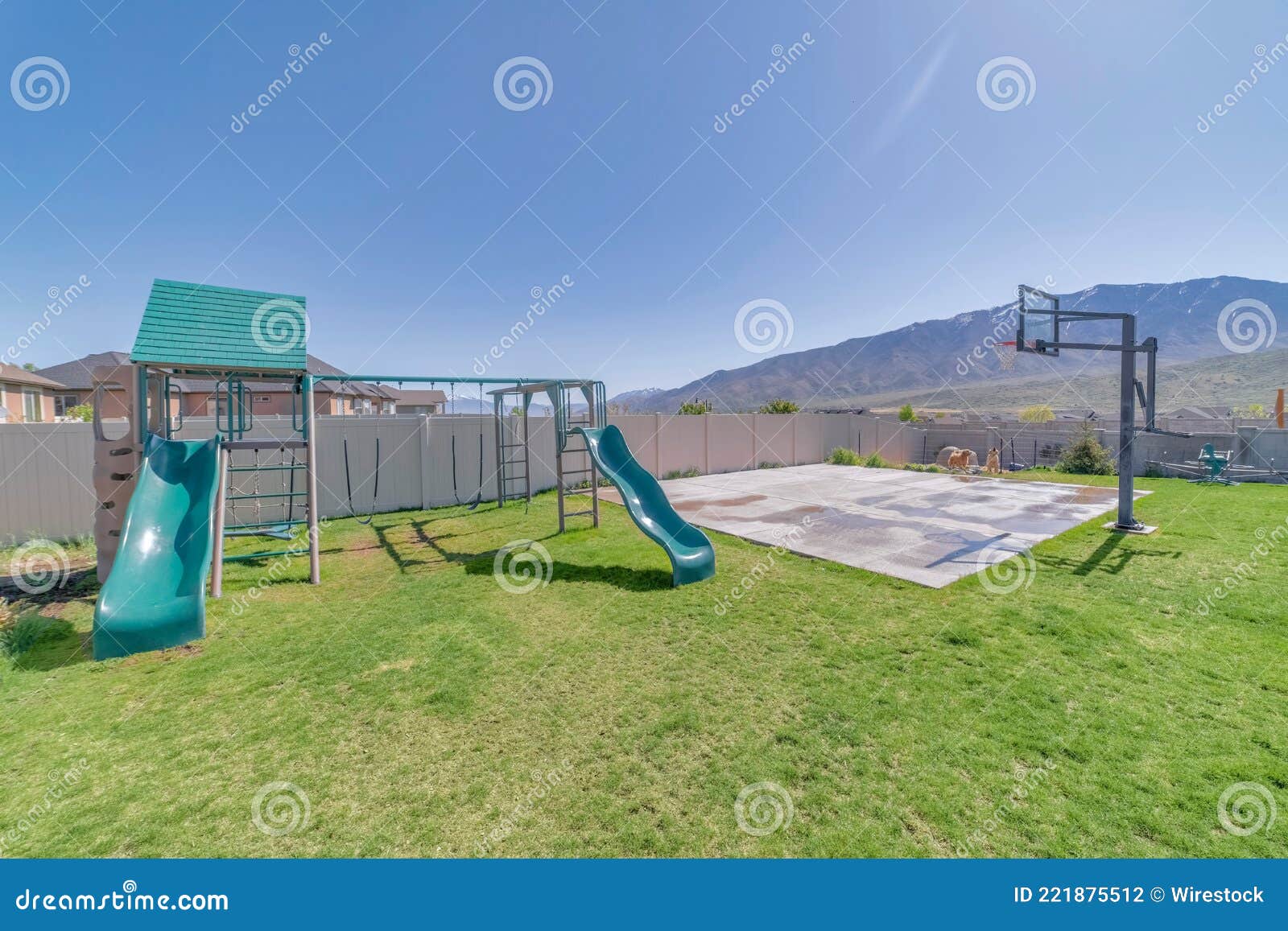 Small Playground with a Slide in a Park Stock Photo - Image of plastic ...