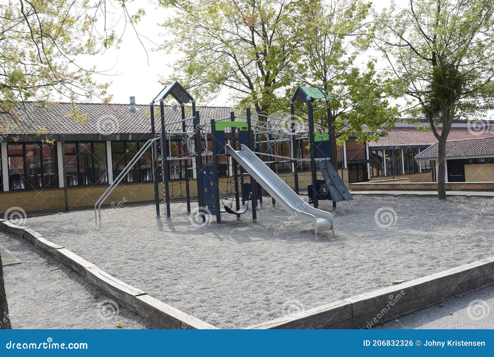Small Playground with a Slide and Swings Stock Photo - Image of ...