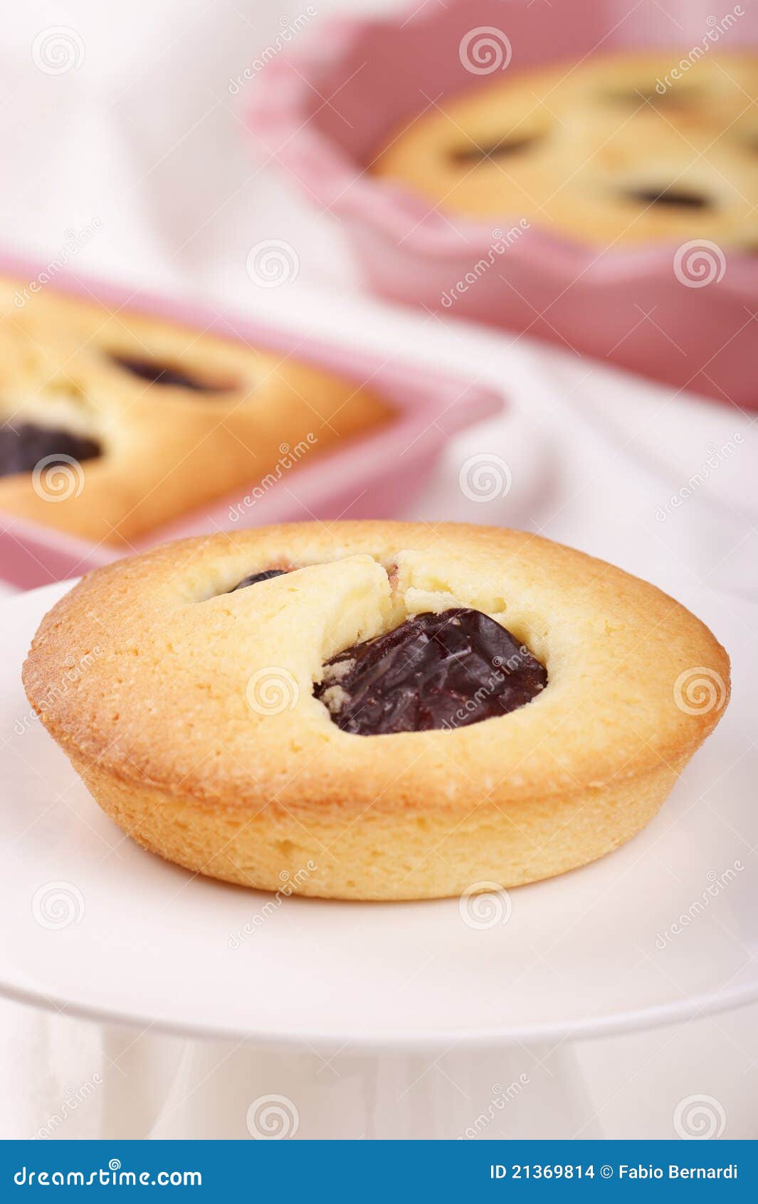 Small plum cake stock photo. Image of stand, food, pottery - 21369814
