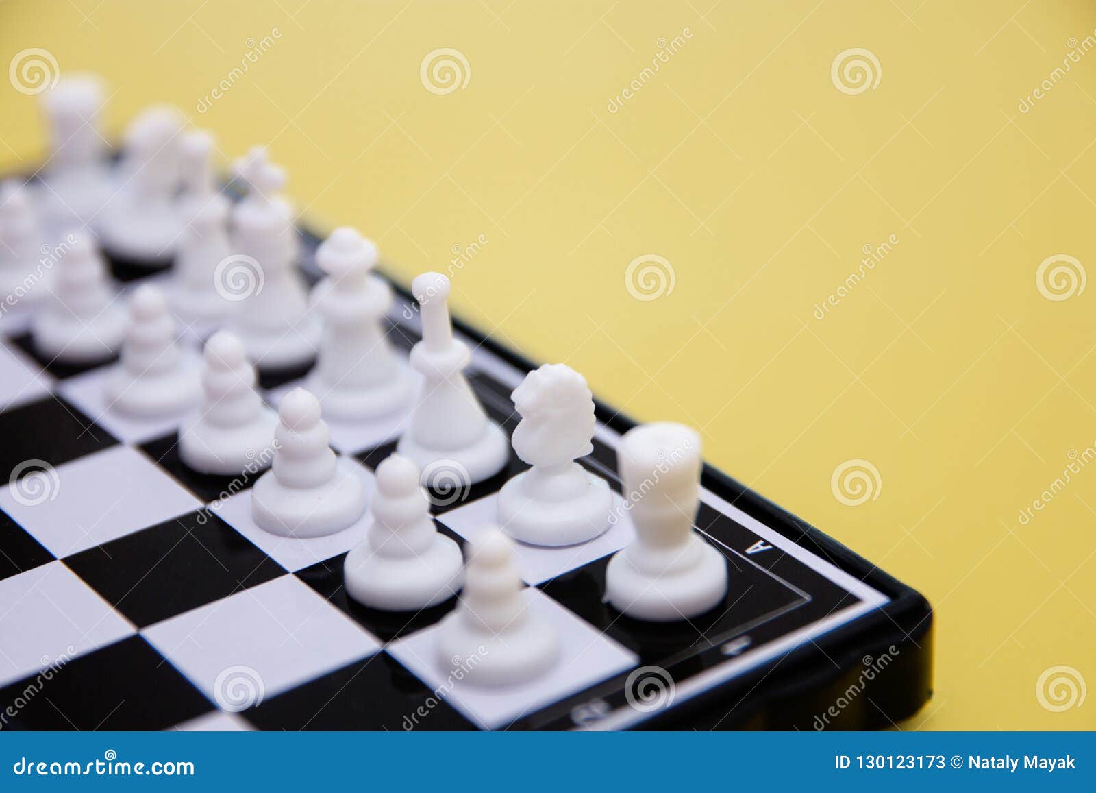 Small Pocket Chess, Plastic Chess Pieces Placed on a Chessboard on a ...