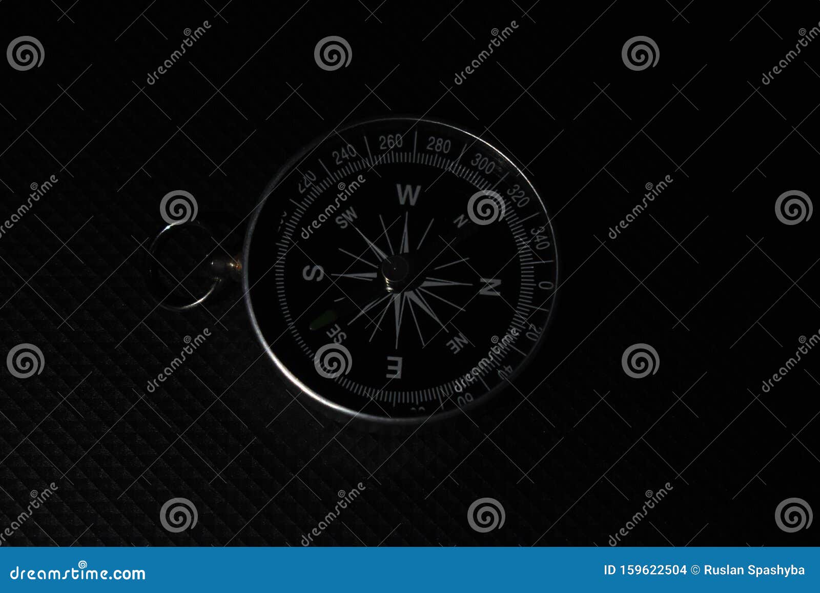 Small Pocket Compass on Black Background Stock Photo - Image of macro ...