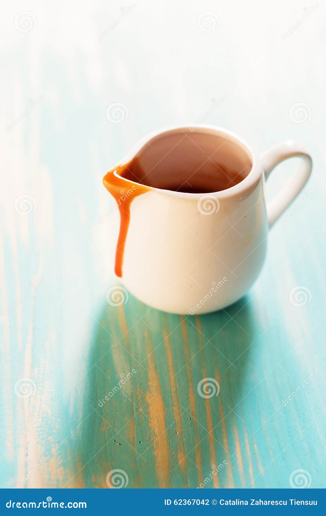 Small Porcelain Pitcher with Rose Hip Jam Stock Photo - Image of ...