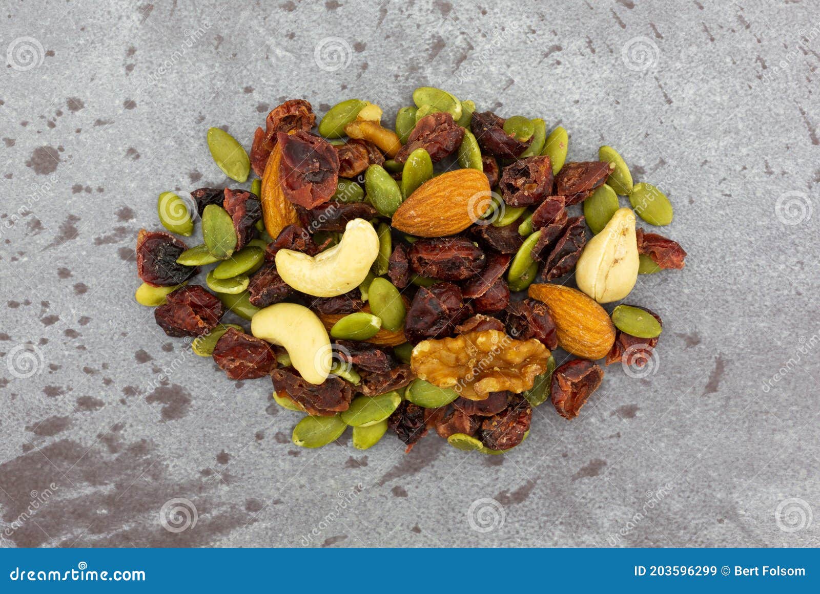 Small Portion of Seeds, Nuts and Fruit on a Gray Background Top View ...