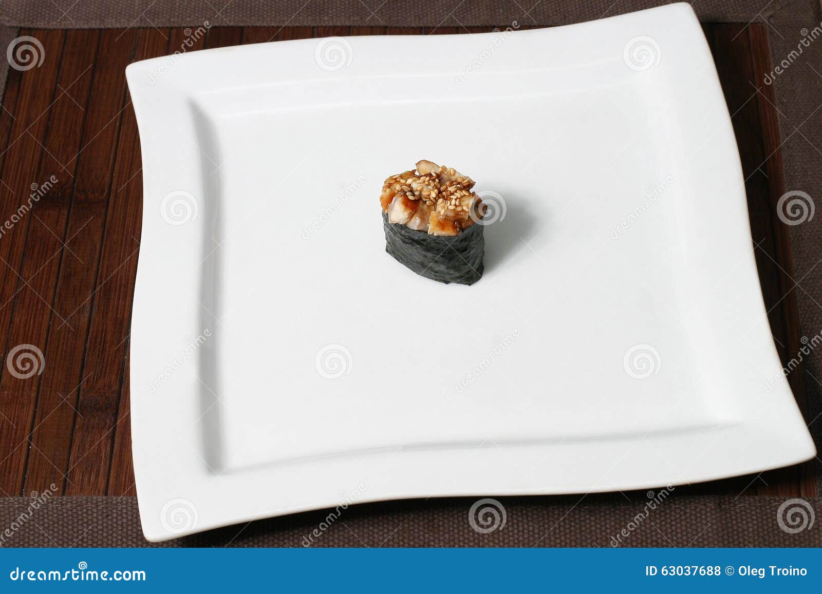Small Portion Suhi on a Large Square White Plate Stock Photo - Image of ...