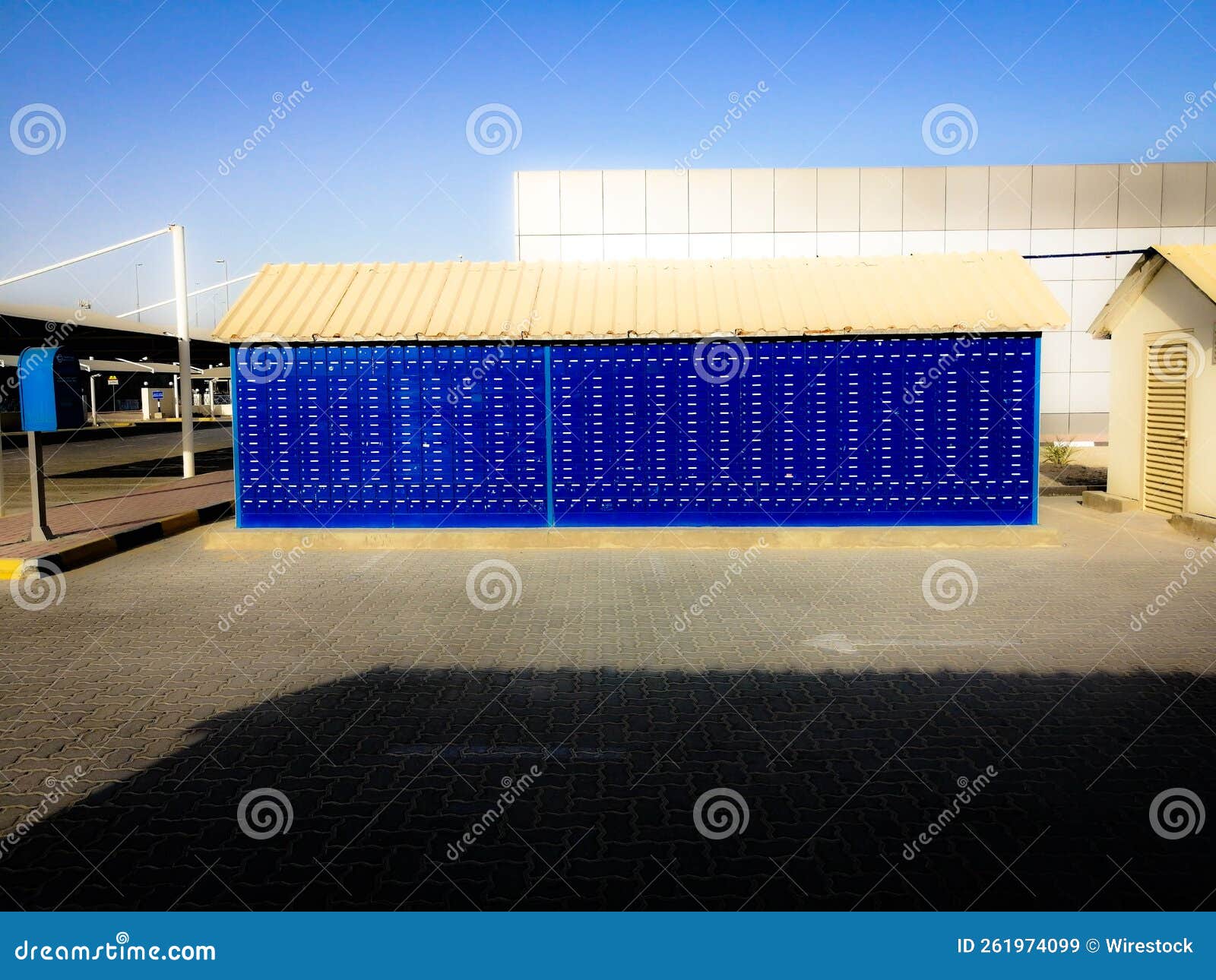 Small Post Office Post Box Building with Bright Blue Lockers Stock ...