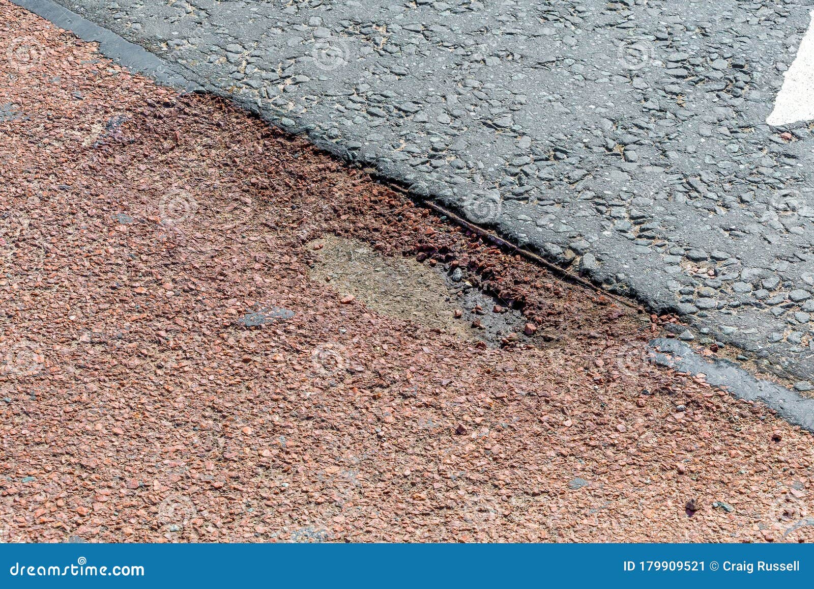 Small pothole in a road stock image. Image of highway - 179909521