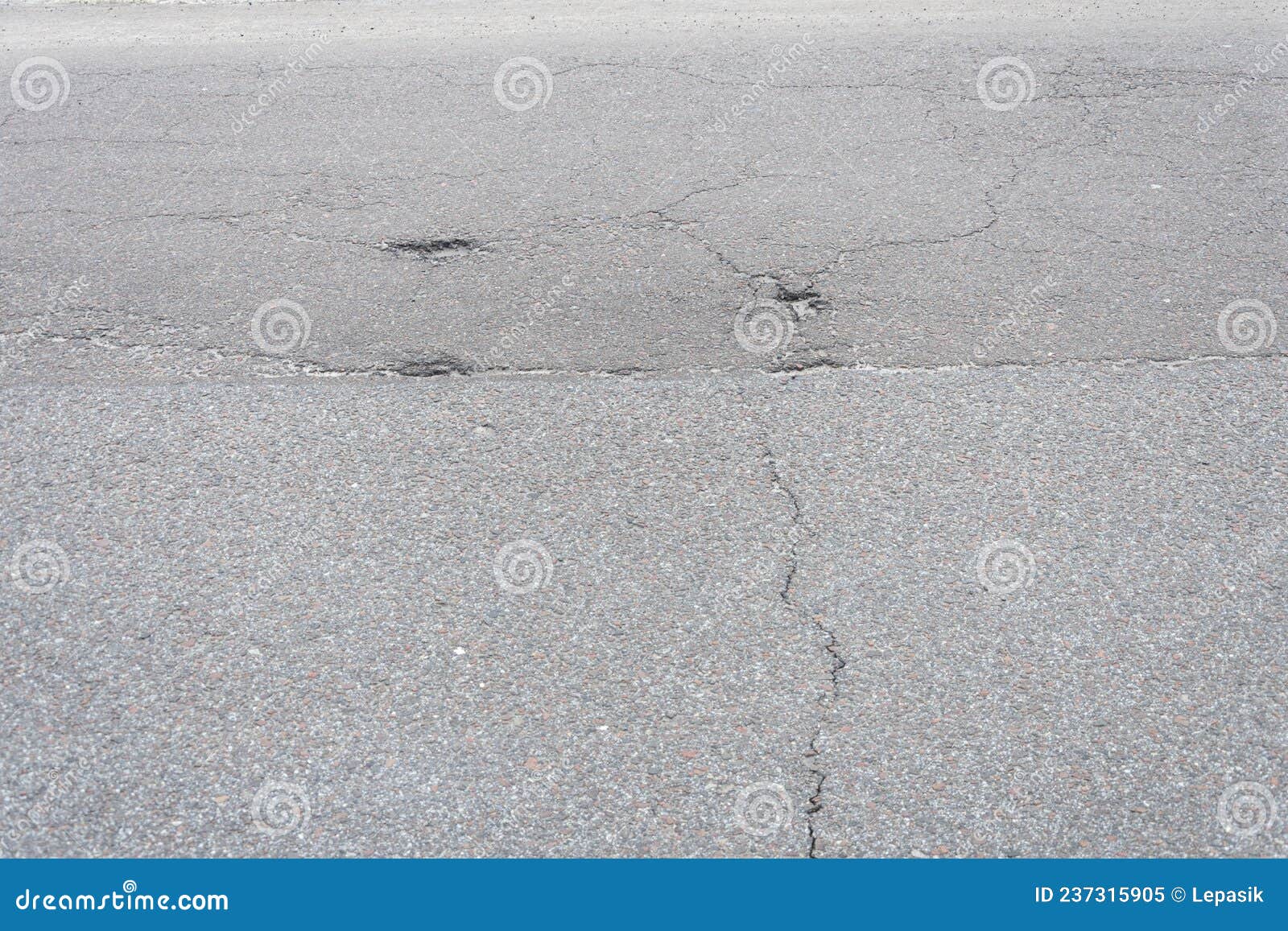Small Potholes on the Asphalt Road, Pits and Destroyed Road Surface ...