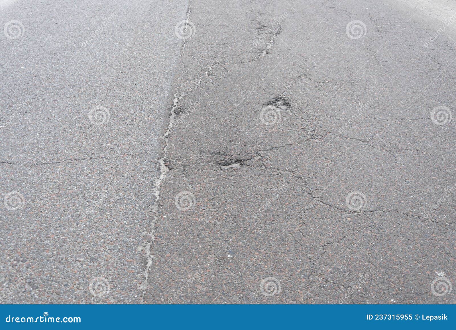 Small Potholes on the Asphalt Road, Pits and Destroyed Road Surface ...