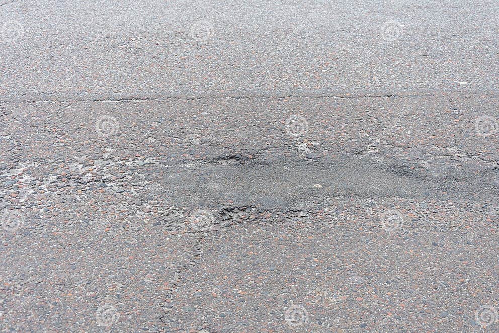 Small Potholes on the Asphalt Road, Pits and Destroyed Road Surface ...