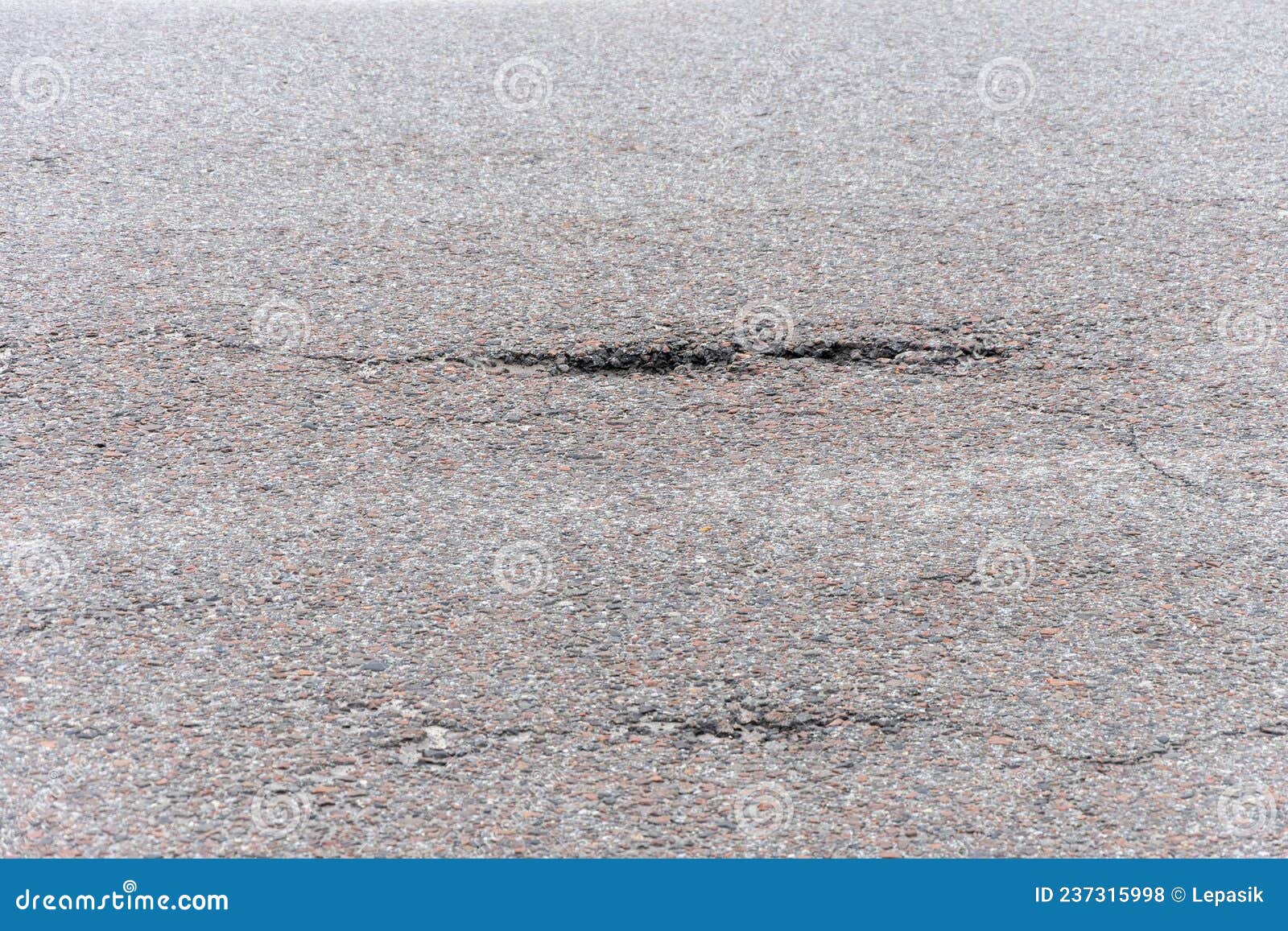 Small Potholes on the Asphalt Road, Pits and Destroyed Road Surface ...