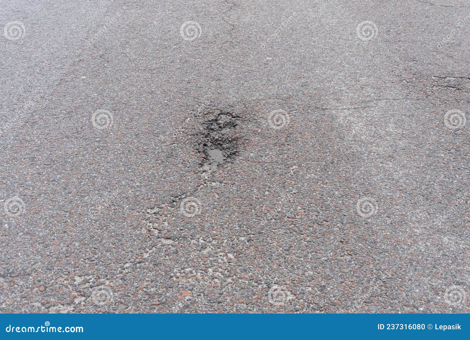 Small Potholes on the Asphalt Road, Pits and Destroyed Road Surface ...