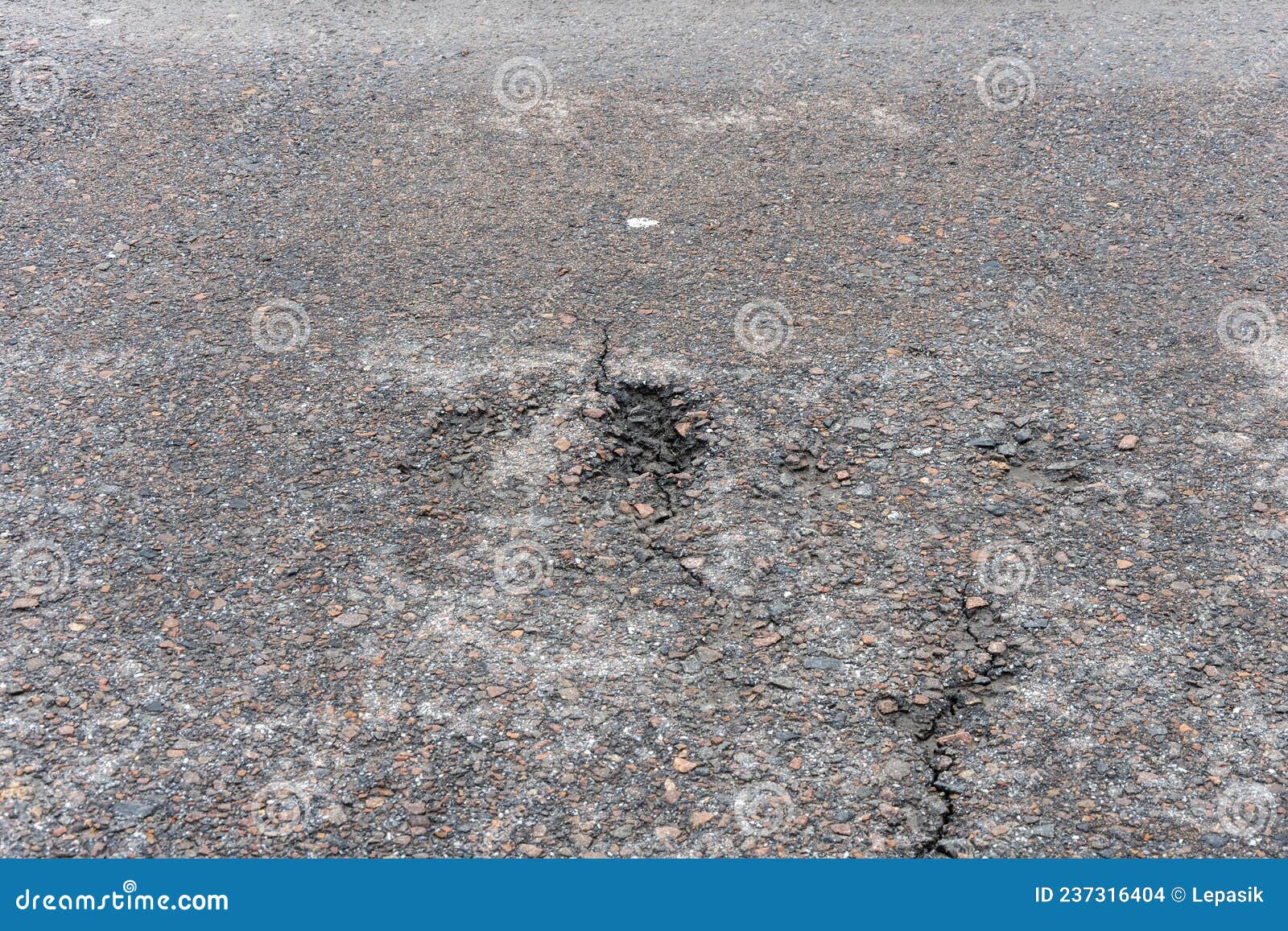 Small Potholes on the Asphalt Road, Pits and Destroyed Road Surface ...