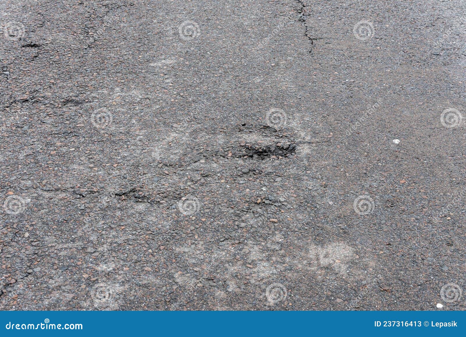 Small Potholes on the Asphalt Road, Pits and Destroyed Road Surface ...