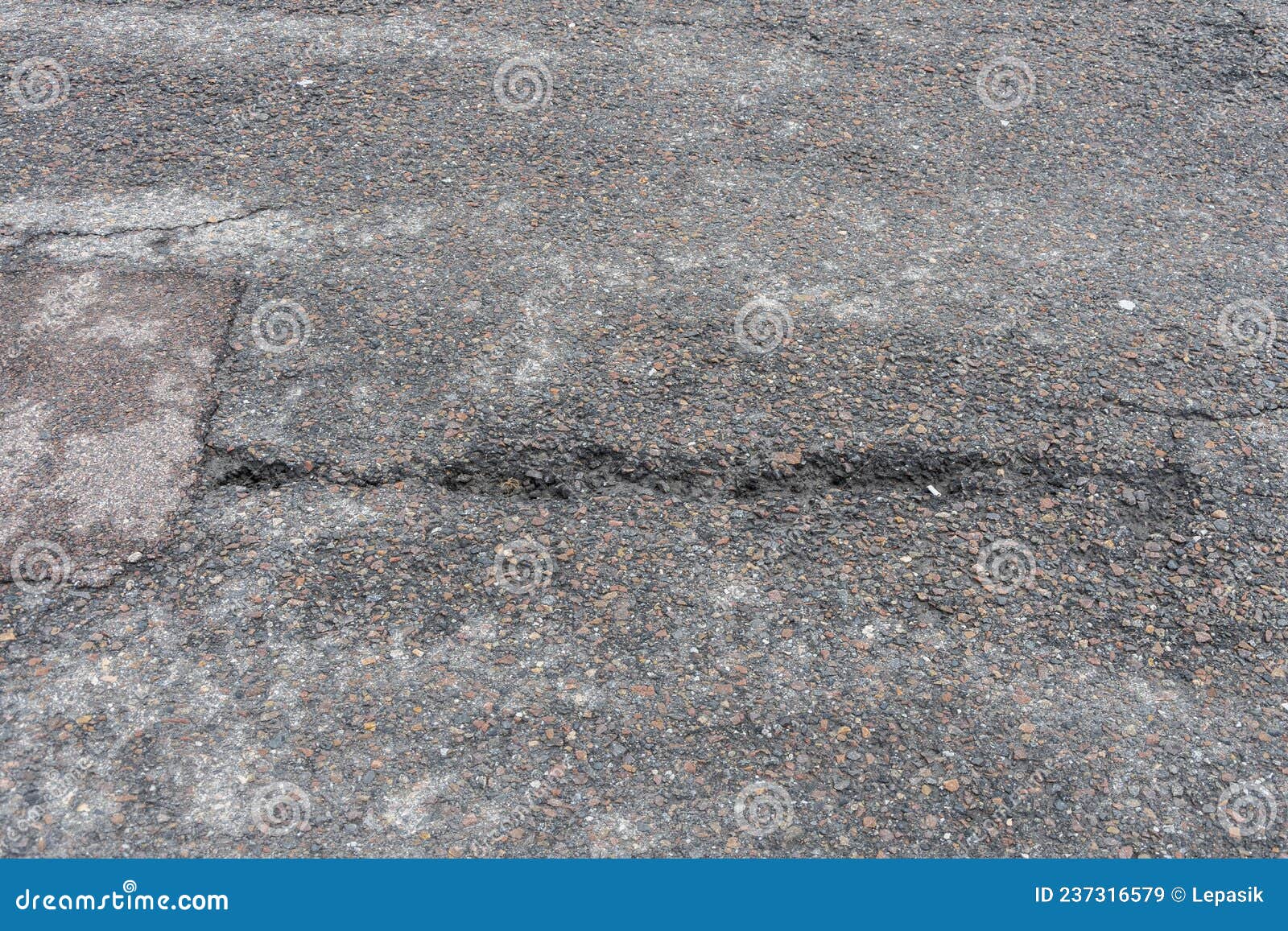 Small Potholes on the Asphalt Road, Pits and Destroyed Road Surface ...
