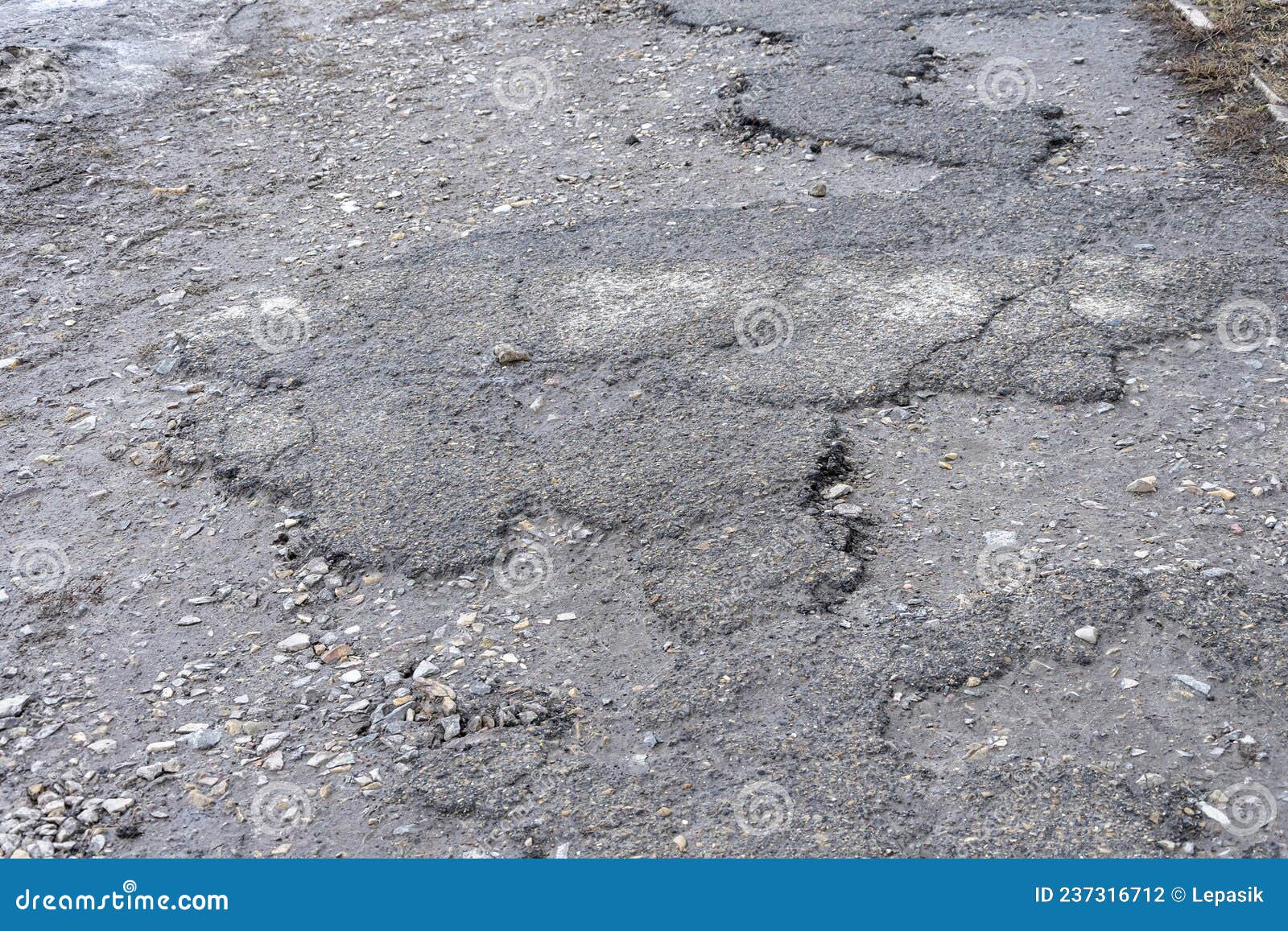Small Potholes on the Asphalt Road, Pits and Destroyed Road Surface ...